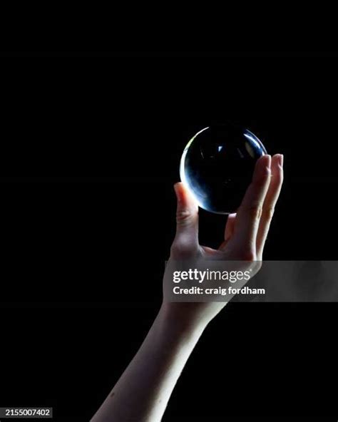 Hand Holding Crystal Ball