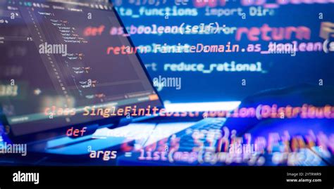 Abstract Software Development Concept With Code And Laptop On Blurred Background Representing