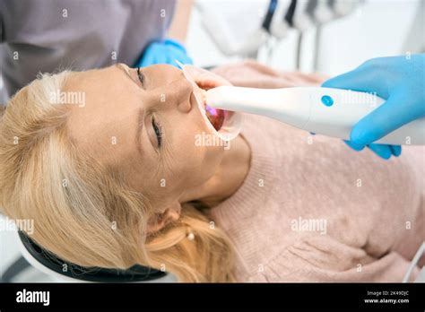 Woman Making Scan Of Jaw In Dental Cabinet Stock Photo Alamy