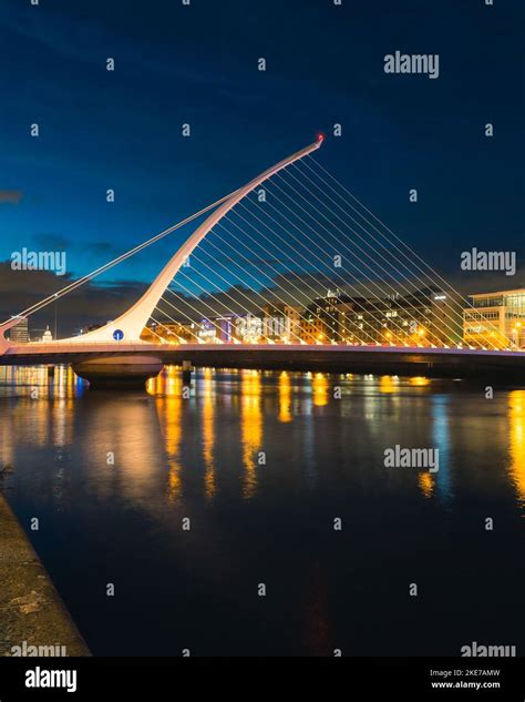 A Vertical Shot Of The Samuel Beckett Bridge In Dublin Ireland At Night