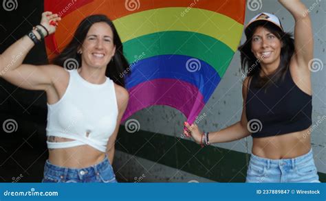 Spanish Lesbian Couple Posing With A Pride Flag Stock Image Image Of