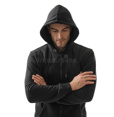 Hacker With Hood Isolated On Black Background With Binary Code In Front