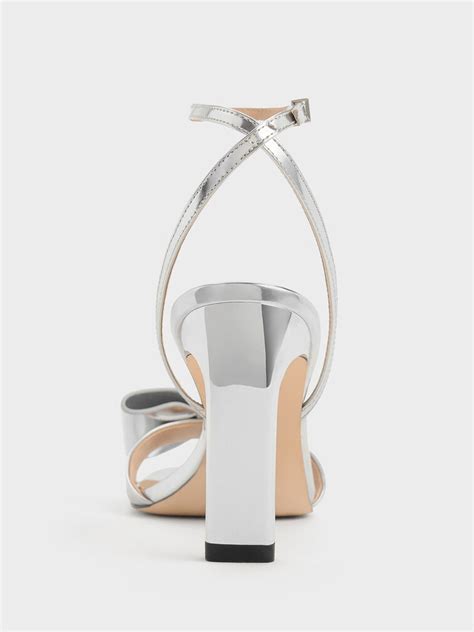 Silver Lu Metallic Leather Bow Blade Heel Sandals Charles And Keith Sg