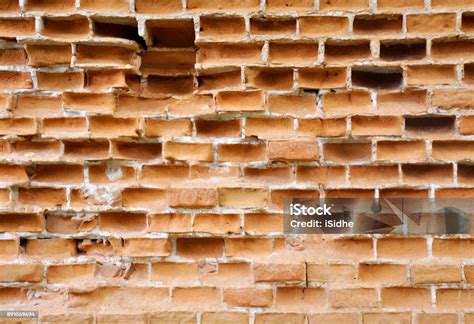 Abstract Background With Ragged Ricketyold Brick Wall With Crumbled
