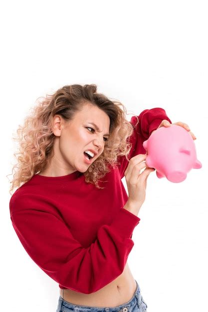 Menina Atrevida Com Um Cofrinho Nas M Os De Branco Foto Premium