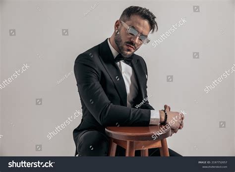 Sexy Confident Man Tuxedo Crouching Holding Stock Photo Shutterstock