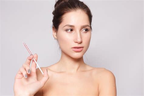 Premium Photo Attractive Young Woman Gets Cosmetic Injection Isolated