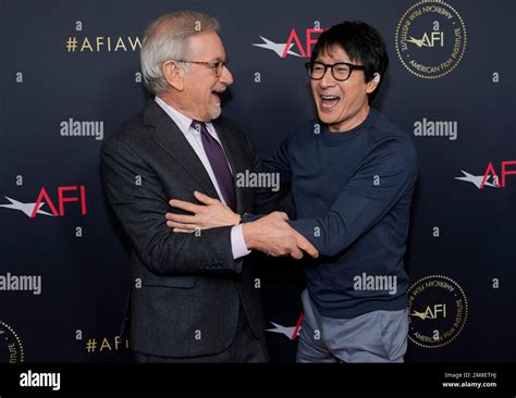 Director Steven Spielberg Left Mingles With Actor Ke Huy Quan At The