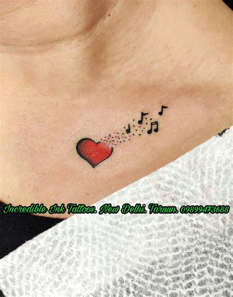 Heart Shaped Music Note Tattoo