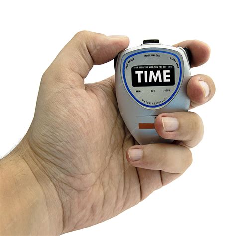 Premium Photo Vertical Shot Of A Hand Holding A Timer Isolated On A