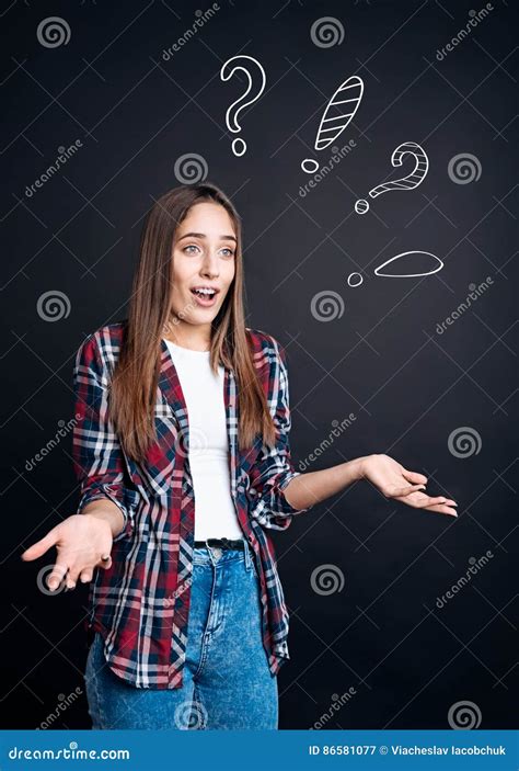 Puzzled Woman Standing On Black Background Stock Image Image Of Mark