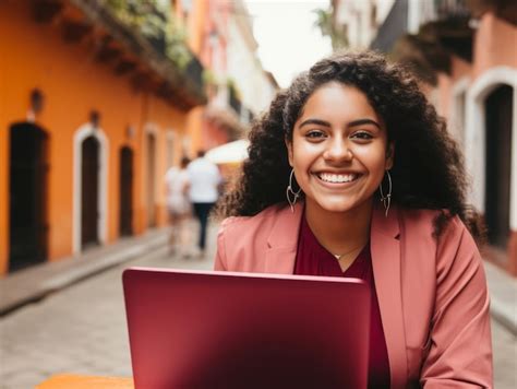 Premium Photo Woman From Colombia Working On A Laptop In A Vibrant