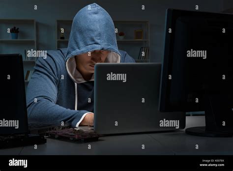 Hacker Hacking Computer At Night Stock Photo Alamy