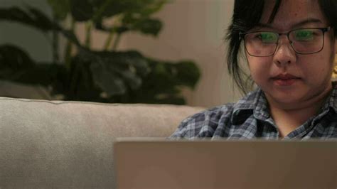 Footage Of Young Asian Woman Freelance Data Scientist Work Remotely At Home Coding Programming