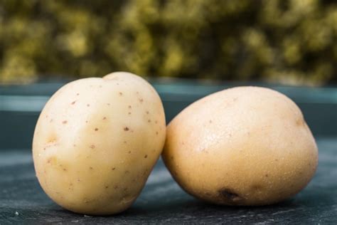 Premium Photo Two Potatoes