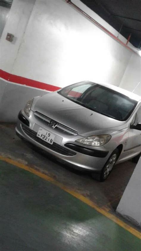 بيجو لون سلفر فحص اربعه جيد سيارات للبيع في الاردن