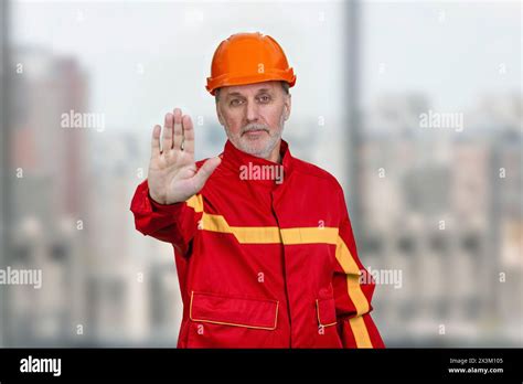 Mature Construction Worker Handyman Shows The No Reject Gesture Sign