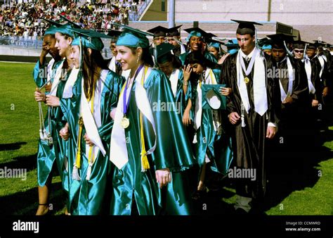 The Deer Valley High School Class Of 2004 March Onto The Field During