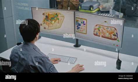 Airport Terminal Checkpoint Female Security Officer Monitoring X Ray Scanning Of Luggage On