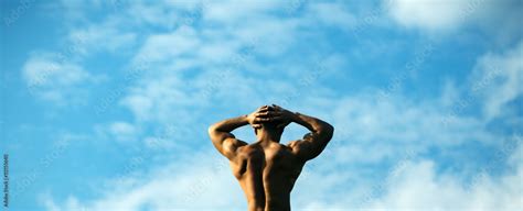 Sexy Muscular Man On Sky Background Stock Photo Adobe Stock
