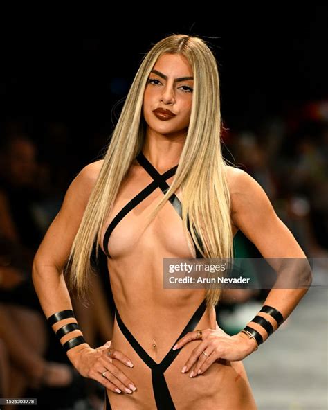 A Model Walks The Runway Wearing Black Tape Project During Miami Swim