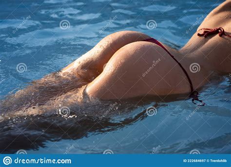 Buttocks In Pool Closeup Summer Journey Sensual Woman With Hot