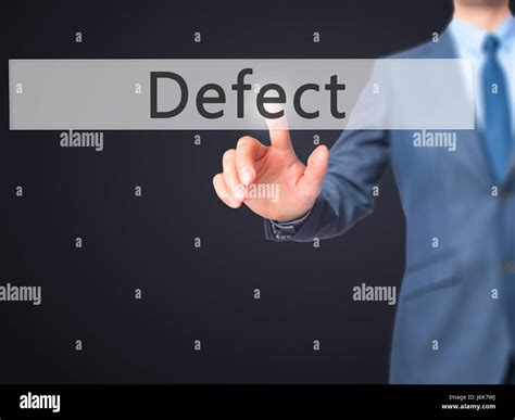 defect businessman hand pushing button on touch screen business