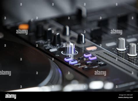 Professional Dj Sound Mixer Device Audio Mixing Controller On Stage In Night Club Stock Photo