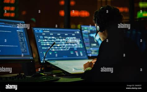 Multiethnic Female IT Technical Support Specialist Talking With A Client In Headphones And