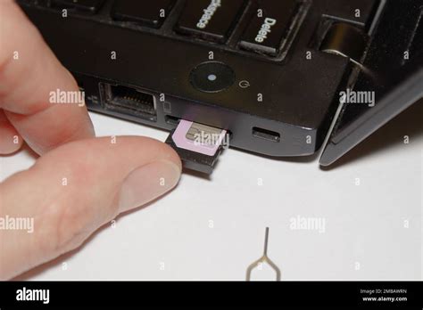 Laptop Sim Slot Insert Internet Sim Card Stock Photo Alamy