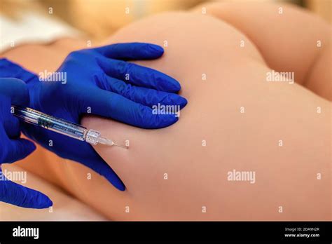 Mesotherapy For Buttocks And Thighs Close Up Shot Of Doctor S Hand Giving Injection To Woman