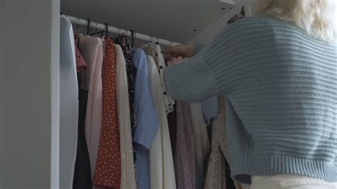 Woman Opens Closet With Dresses Stock Footage SBV Storyblocks
