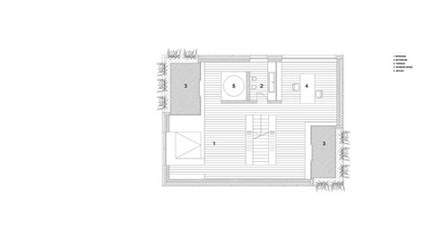 Ofis Arhitekti Adds Grid Of Crosses To Facade Of Ljubljana House