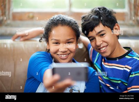 Taking A Brother Sister Selfie A Little Brother And Sister Taking A