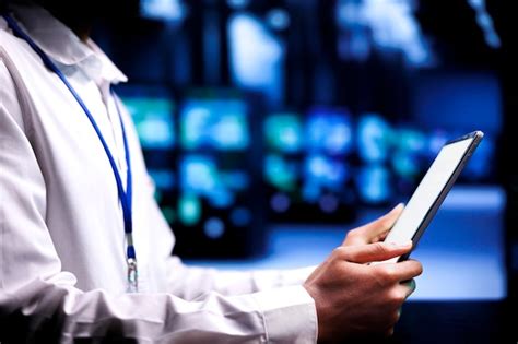 Premium Photo Skillful Repairman Resolving Performance Related Issues In Server Farm Developer