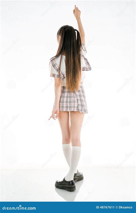 Сексуальный азиатский студент девушки в школьной форме Стоковое Изображение изображение