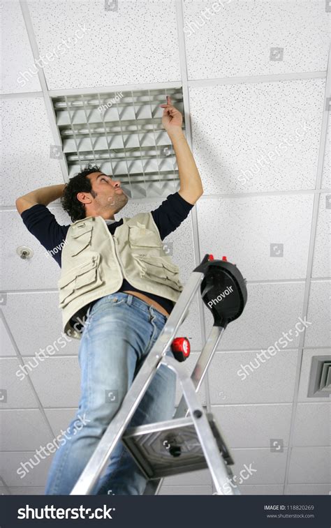 Man Replacing Ceiling Panel Stock Photo 118820269 Shutterstock