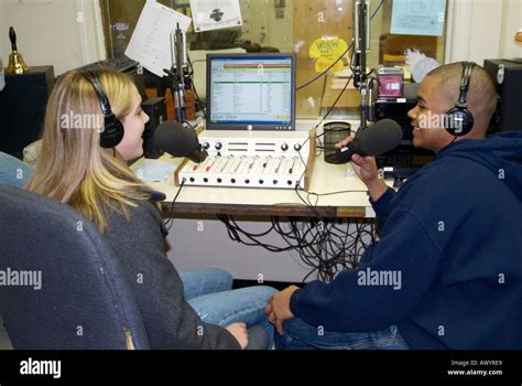 Ethnic Male And Female High Babe Babes Learn About Radio Broadcasting In A Communications