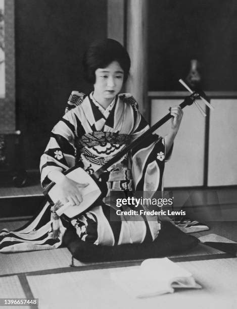 Three Stringed Instrument Photos And Premium High Res Pictures Getty Images