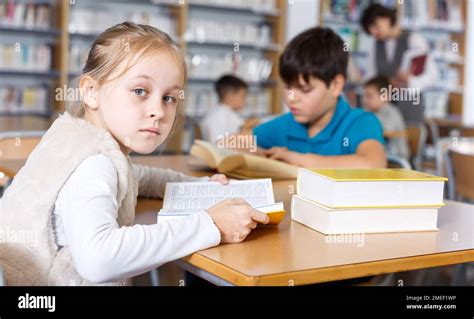 Tween Girl In Babe Library Stock Photo Alamy