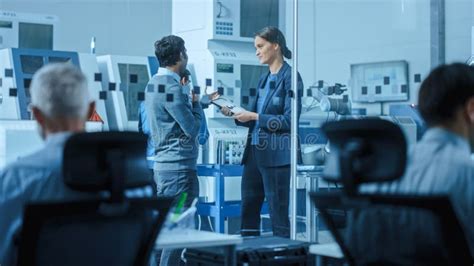 Modern Factory Female Project Manager Male Engineer Standing In High