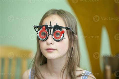 A Girl In Special Glasses For The Treatment Of Vision Problems Stock Photo At Vecteezy