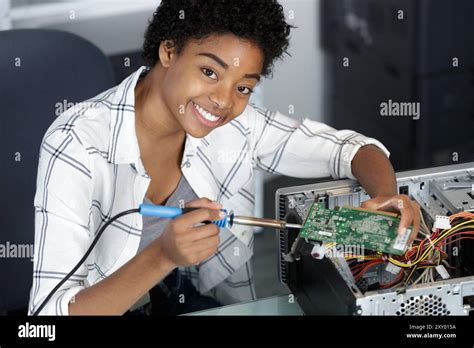 Female Engineer Fixing Broken Computer Hard Drive Stock Photo Alamy