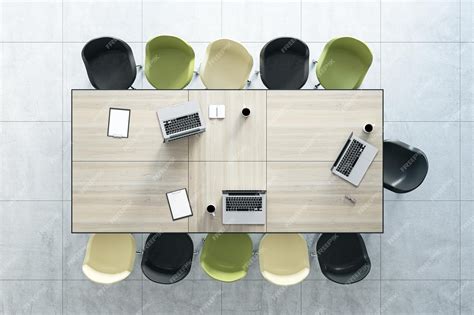 흰색 녹색과 검은색 의자 3d 렌더링으로 둘러싸인 노트북과 커피 머그잔이 있는 나무 회의 테이블에서 최고의 전망을 제공하는