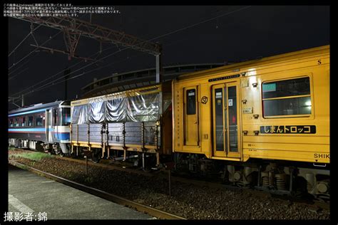 2nd train JR四キハ185系3100番台2両 キハ54 4 トラ45000形152462 コトラ での回送列車が運転の写真