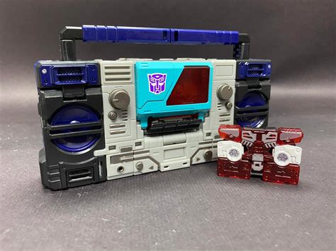 Transformers Shattered Glass Blaster In Hand Images Transformers News