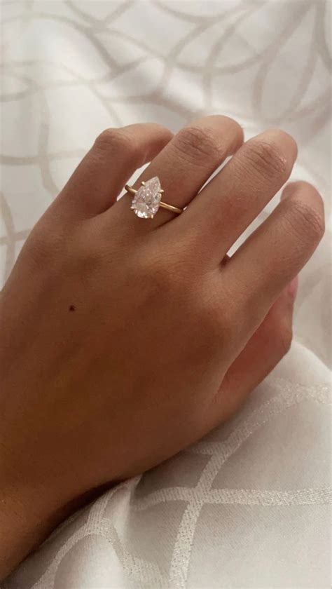 Gold Pear Shaped Diamond Ring Meaning Of Engagement Ring Shapes Gold
