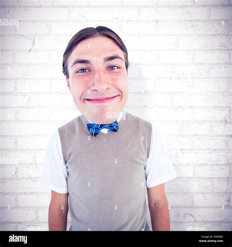 Composite Image Of Nerd Smiling Stock Photo Alamy
