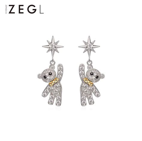 Zegl Ээмэг 45 000₮ Материал Циркон шигтгээ Мөнгөн зүүтэй 18к цагаан алтан бүрмэл ☑️БЭЛЭГНИЙ