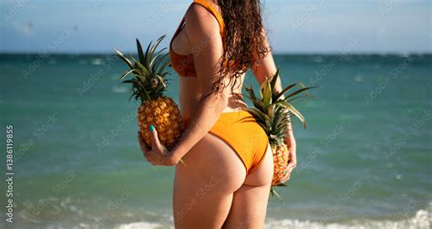 Beautiful Caucasian Sunbathed Woman Model In Swimsuit Posing On Summer